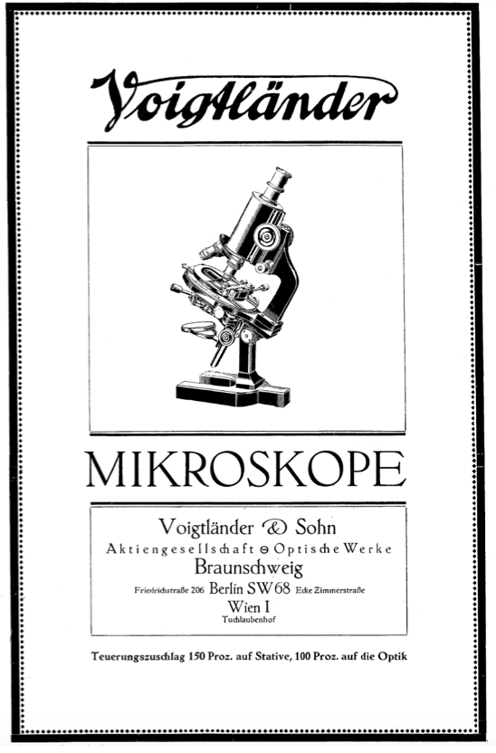 A black and white photo of a microscopeDescription automatically generated