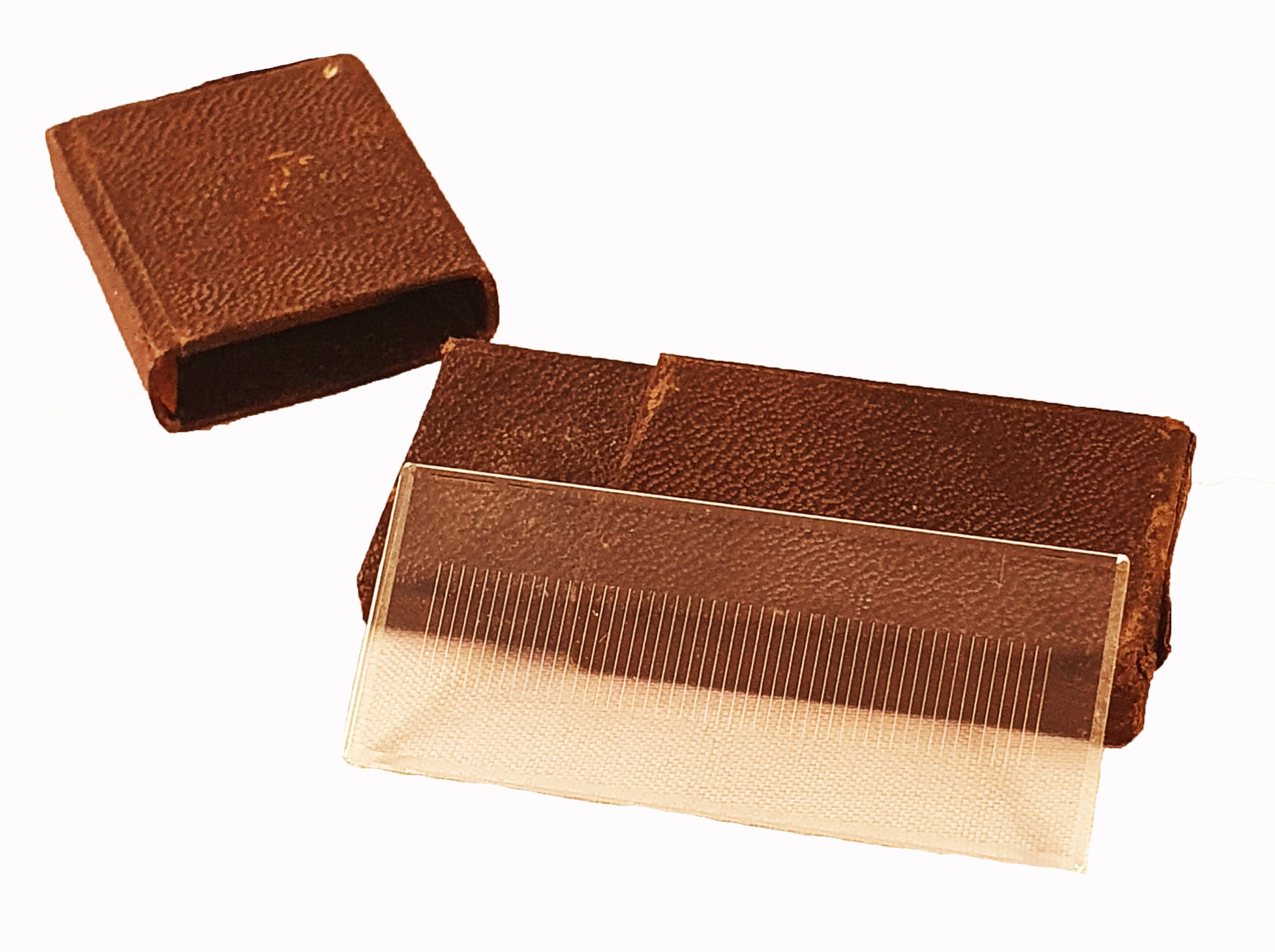 A picture containing brown, box, chocolate bar ...