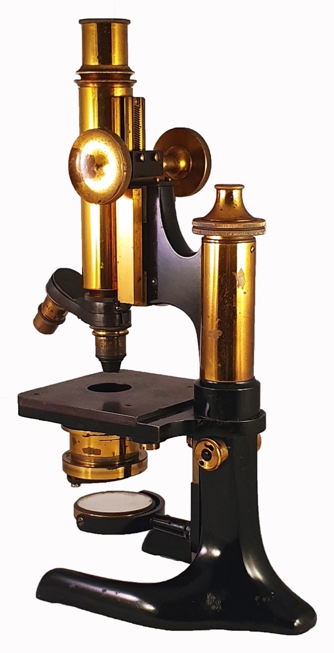 A picture containing table, front, old, smallDescription automatically ...