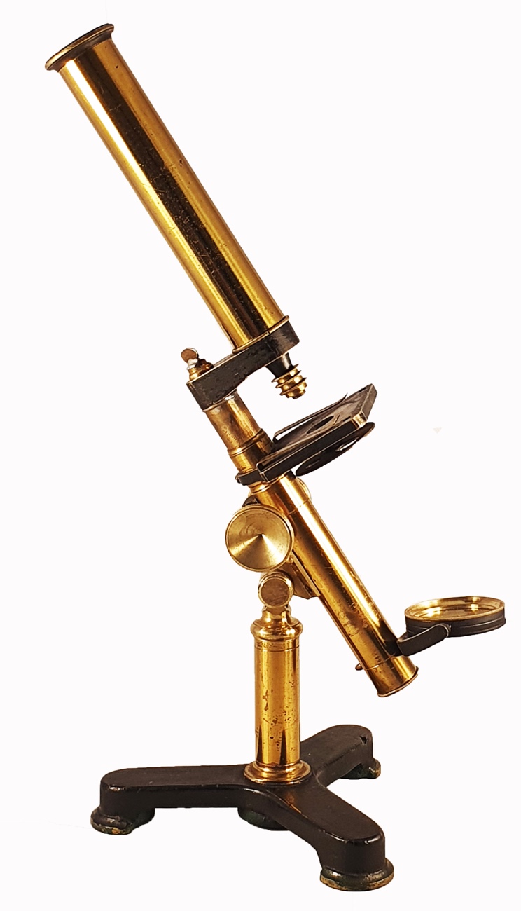 A Close Up Of A Gold Microscopedescription Automatically Generated