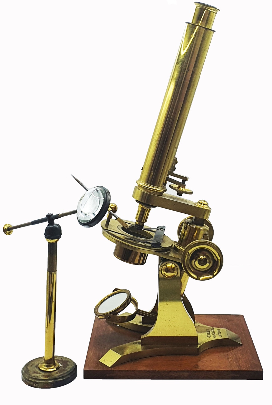 A close-up of a microscopeDescription automatically generated