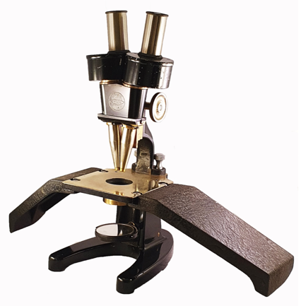 A close-up of a microscopeDescription automatically generated